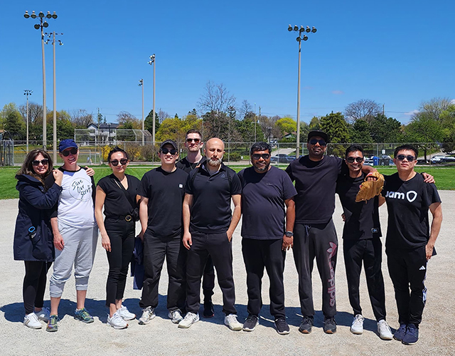 Brushes, Bats, and Bonding: OECM Hosts Staff Painting Day and Softball ...